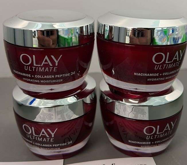 (4) JARS OF OLAY MOISTURIZER - Earl's Auction Company
