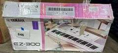 YAMAHA EZ-300 DIGITAL KEYBOARD IN BOX - Earl's Auction Company