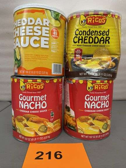 (4) CANS OF CHEESE SAUCE - Earl's Auction Company