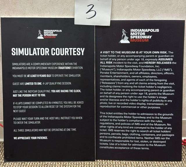 (2) IMS MUSEUM SIGNS (SIMULATOR & RISK) - Earl's Auction Company