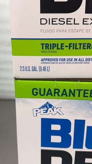 (2) JUGS OF PEAK BLUE DEF - Earl's Auction Company