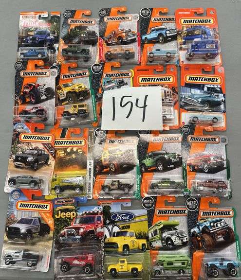 (20) ASSORTED MATCHBOX CARS IN PACKS - Earl's Auction Company