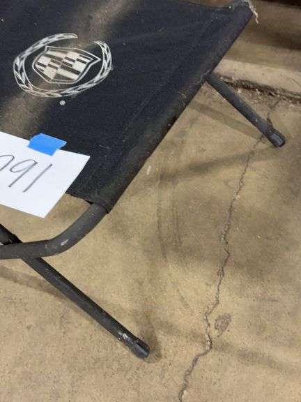 SMALL CADILLAC FOLDING STOOL - Earl's Auction Company