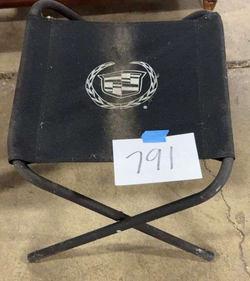 SMALL CADILLAC FOLDING STOOL - Earl's Auction Company