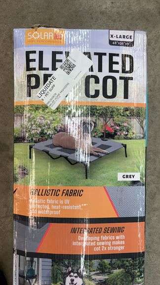SOLARTEC ELEVATED PET COT IN BOX - Earl's Auction Company