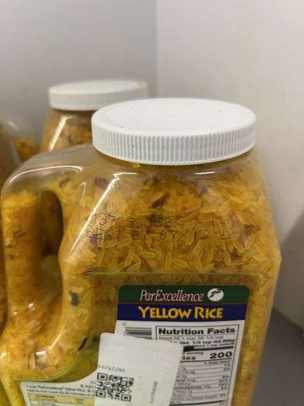 (4) JUGS OF PAR EXCELLENCE YELLOW RICE - Earl's Auction Company