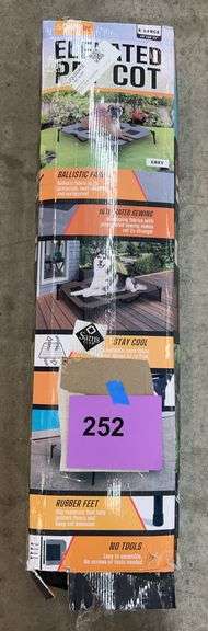 SOLARTEC ELEVATED PET COT IN BOX - Earl's Auction Company