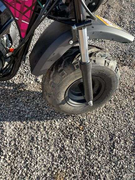 UNUSED COLEMAN RB200 MOTORCYCLE - EK Auctioneers LLC