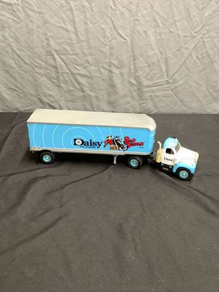 DAISY RED RIDER DIE CAST TRUCK AND TRAILER - EK Auctioneers LLC