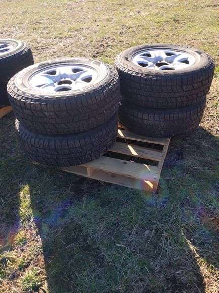 QTY (4) 275 X 65 R18 TIRES AND RIMS - EK Auctioneers LLC