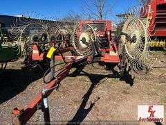 HESSTON 8 WHEEL V RAKE W/ CENTER KICKER WHEEL - EK Auctioneers LLC