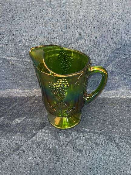 Carnival glass pitcher - Auction Services LTD