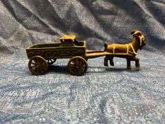 Cast iron goat wagon - Auction Services LTD
