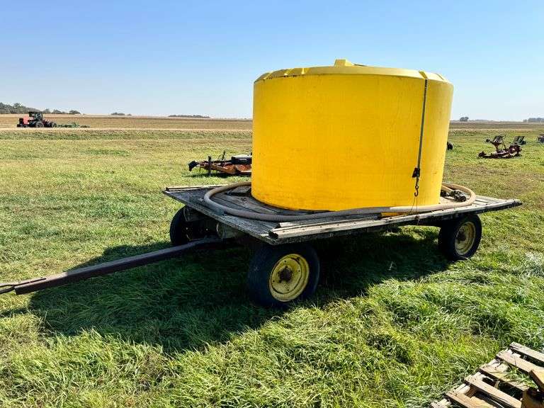 1350 Gallon Poly Tank on Trailer with 2” Pump - Fragodt Auction and ...