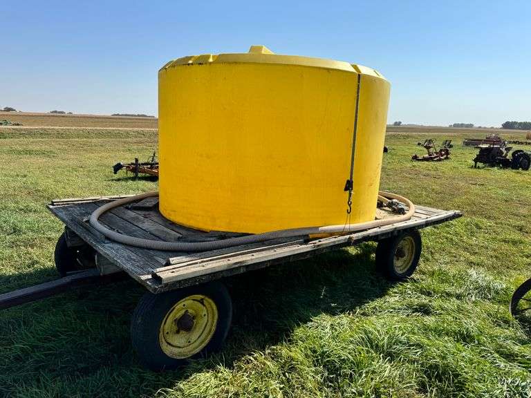 1350 Gallon Poly Tank on Trailer with 2” Pump - Fragodt Auction and ...