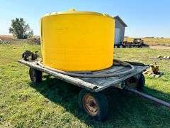 1350 Gallon Poly Tank on Trailer with 2” Pump - Fragodt Auction and ...