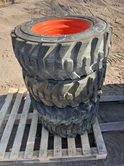 *Located in Tucson, AZ* (4) Bobcat 10-16.5 Severe Duty Tires on Small 8 ...