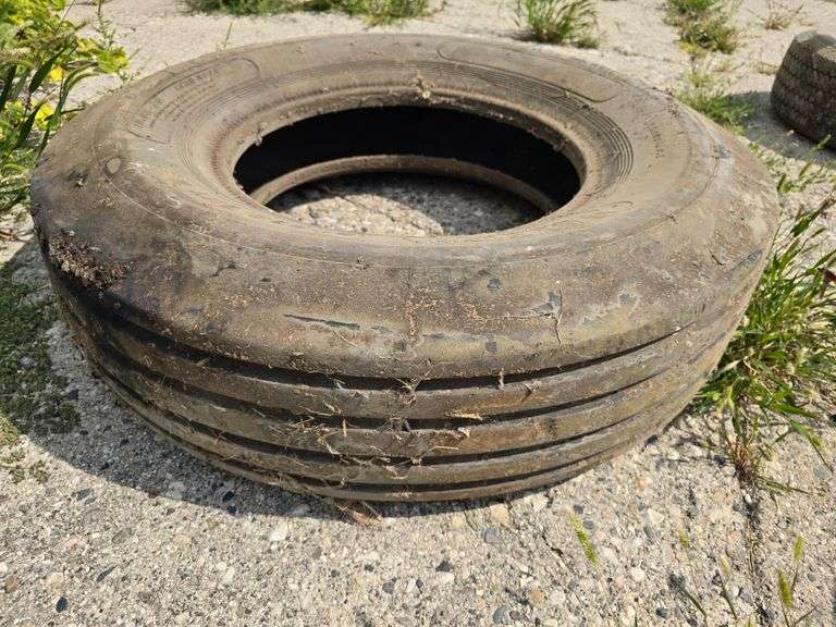 (1) 10.00-20 Used Tire - Fragodt Auction and Real Estate LLC