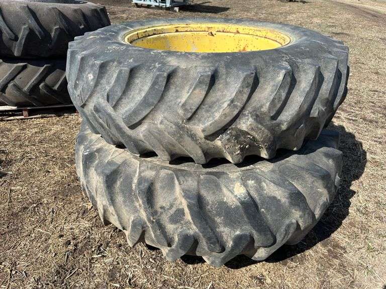 (2) 18.4x38 Armstrong Tires and 10 Bolt Rims - Fragodt Auction and Real ...