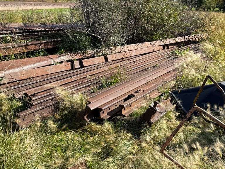 Approx 100 Pieces of 90 Pound Railroad Rail, Approx 30’ Long Pieces ...