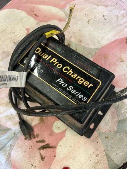 Depth finder, fly rod, charger - Gary Realty & Auction