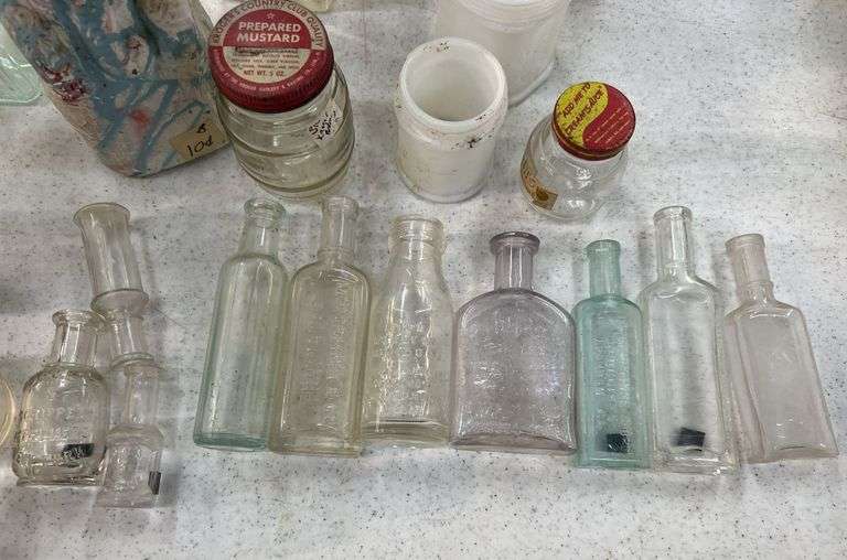 Assorted medicine and other bottles - Gary Realty & Auction