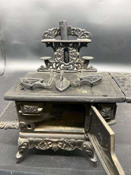 Mini cast iron stove - Gary Realty & Auction