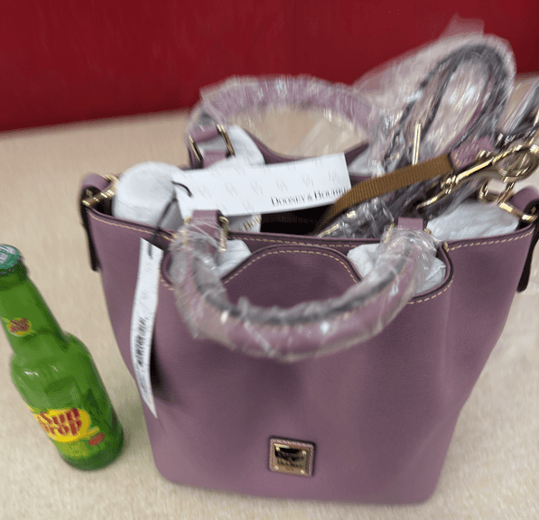 Dooney and bourke purse - Gary Realty & Auction