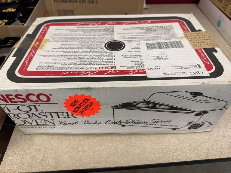 Roaster, pressure cooker new in box - Gary Realty & Auction
