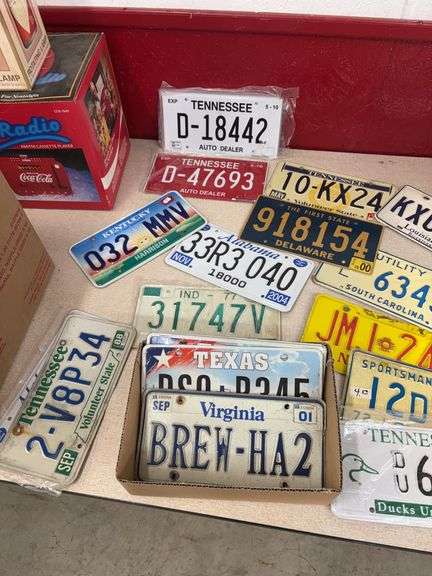 20 Assorted car tags - Gary Realty & Auction