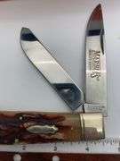 Marbles back pocket trapper - Gary Realty & Auction