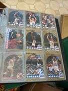 Pile of baseball, basketball, football cards - Gary Realty & Auction