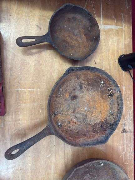 (4) cast iron skillets - Gary Realty & Auction