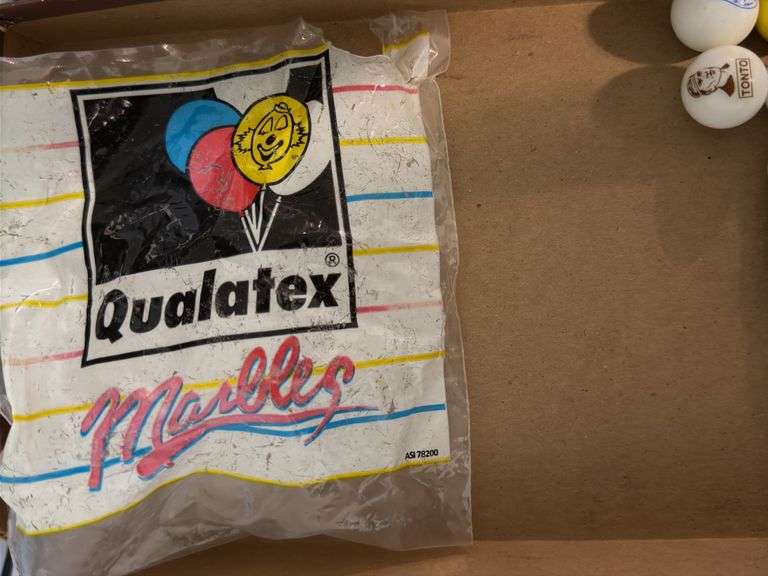 Assorted advertising marbles - Gary Realty & Auction