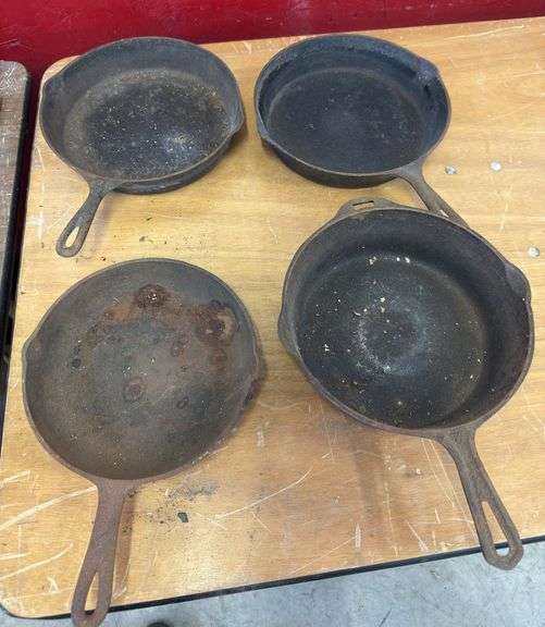 (4) cast iron skillets - Gary Realty & Auction