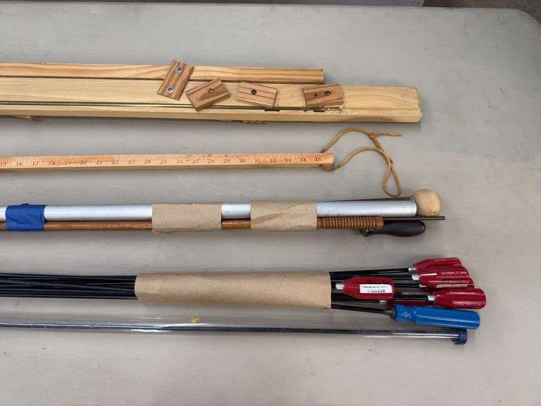 Assorted ram rods etc - Gary Realty & Auction