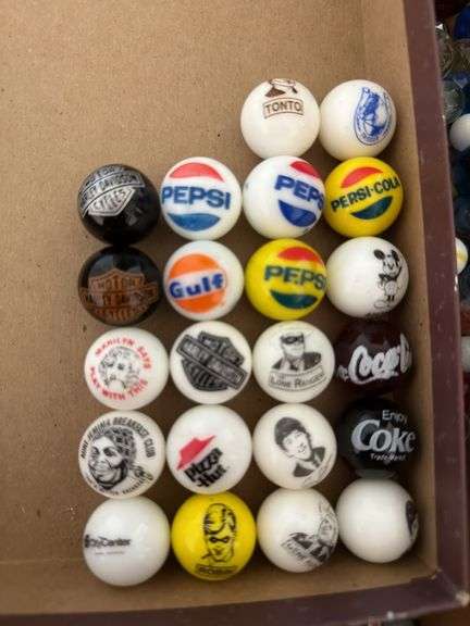Assorted advertising marbles - Gary Realty & Auction