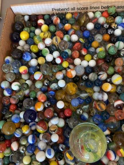 Assorted marbles - Gary Realty & Auction