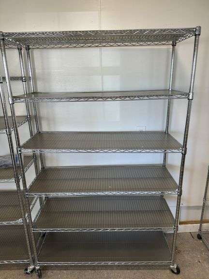 Rolling metal rack 48x18x76 - Gary Realty & Auction