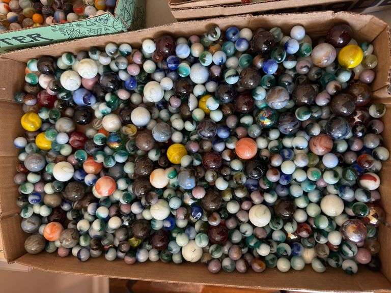 Assorted marbles - Gary Realty & Auction