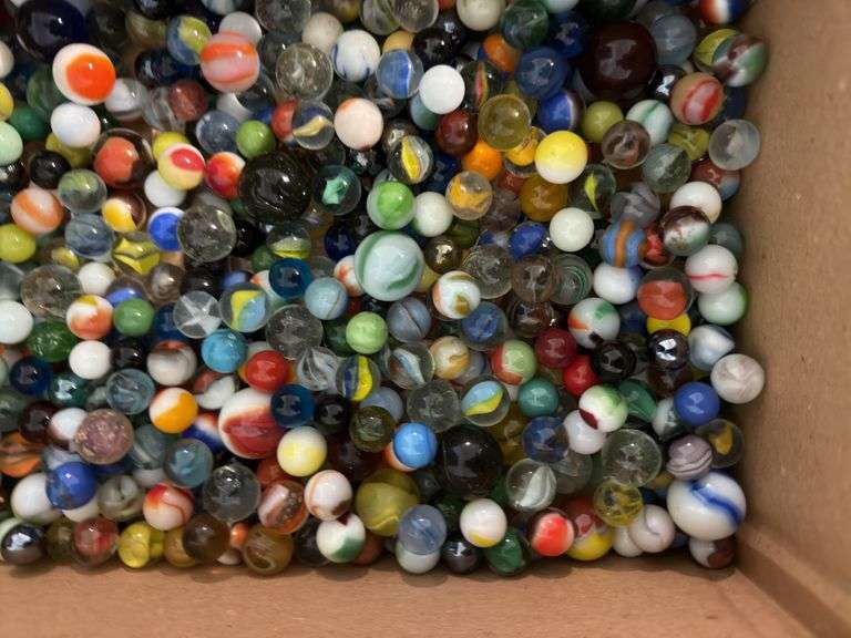 Assorted marbles - Gary Realty & Auction
