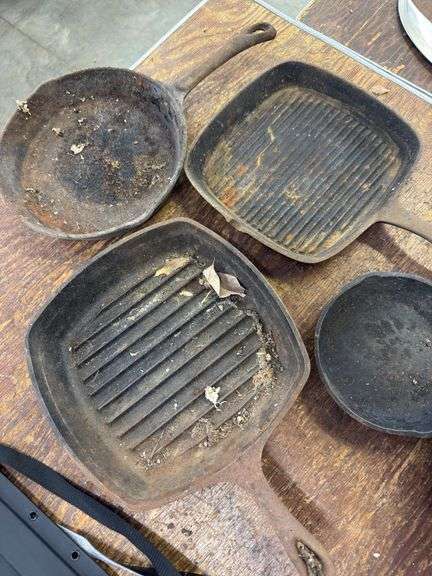 (4) cast iron skillets - Gary Realty & Auction