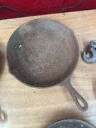 (4) cast iron skillets - Gary Realty & Auction