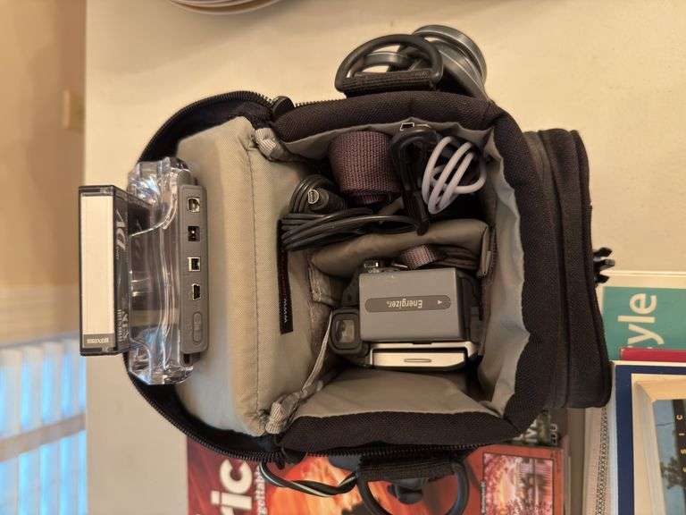 Video camera, books - Gary Realty & Auction