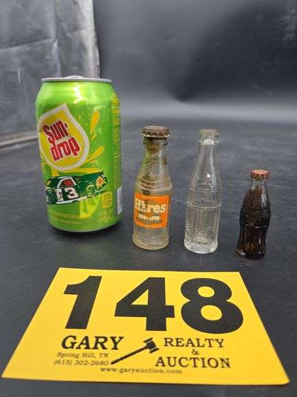 3 Mini glass bottles: Hires, Behind, Coca-Cola - Gary Realty & Auction