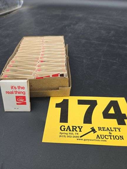 50 packs "it's the real thing " Coke - Gary Realty & Auction