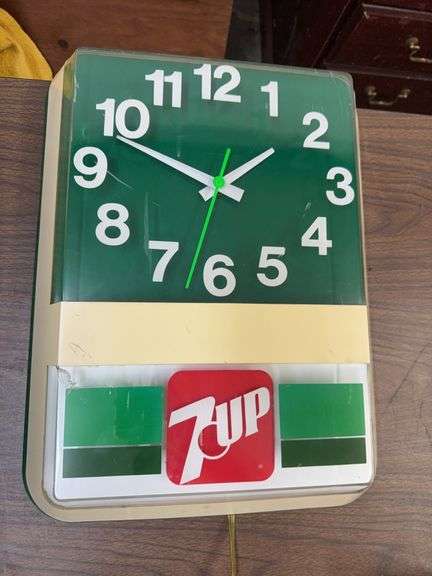 7up clock. Light works, clock doesn’t - Gary Realty & Auction