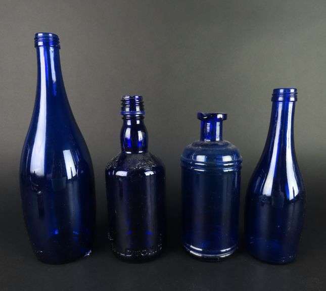 Lot of 4 Collectible Cobalt Blue Bottles - GC5 Auctions