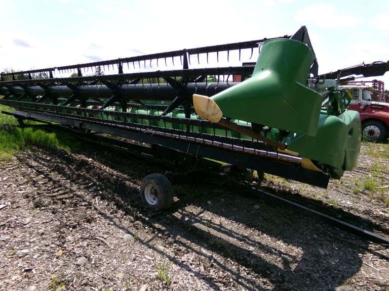John Deere 635F combine head with Horst cart - Gregg Auctions