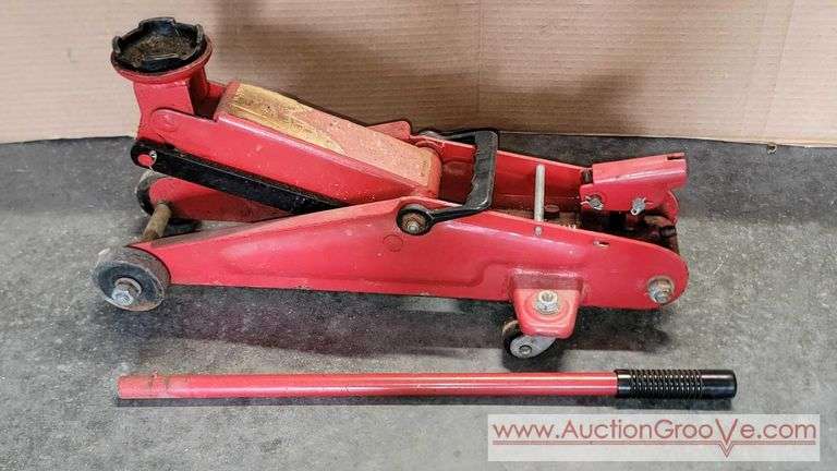 Hydraulic Floor Jack. Pumped it up and it held my weight. Stood on it ...